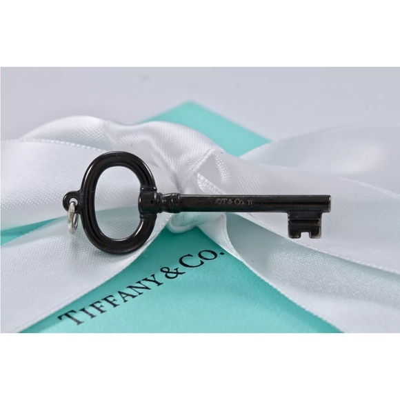 Tiffany & Co. | Jewelry | Tiffany Co Silver Titanium Oval Key Pendant ...